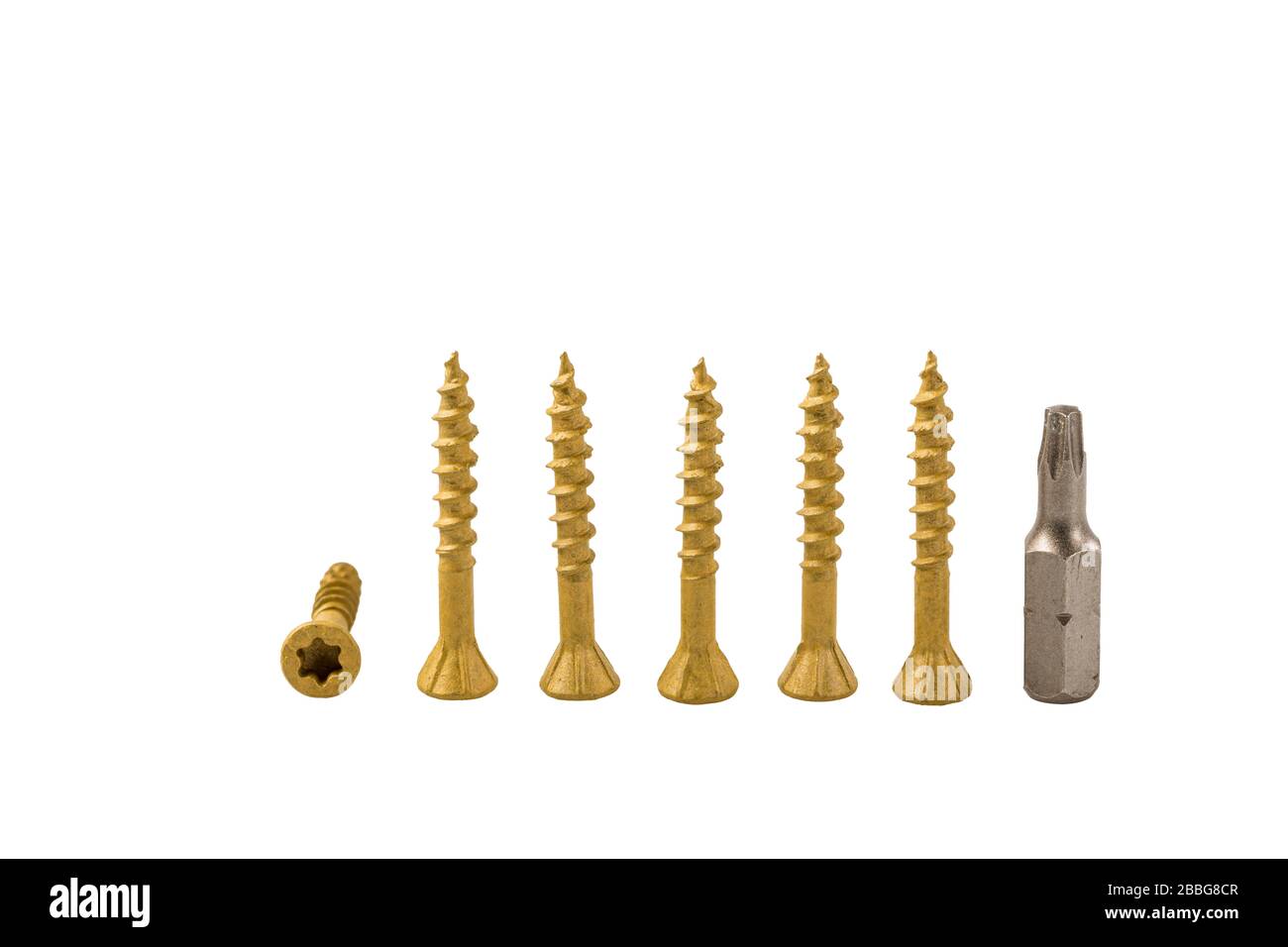 Close up view of screws and cross magnetic bit isolated. Industrial ...