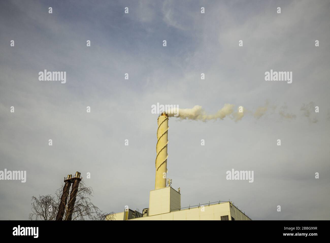 View of white smoke from chimney on blue sky background. Ecology and ...