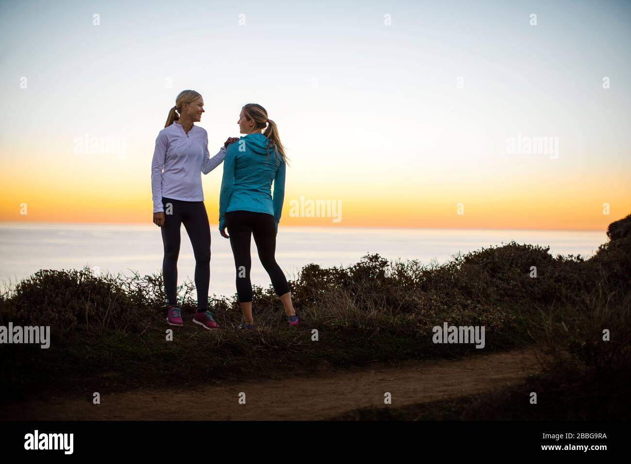 Two women touching each other hi-res stock photography and images - Alamy