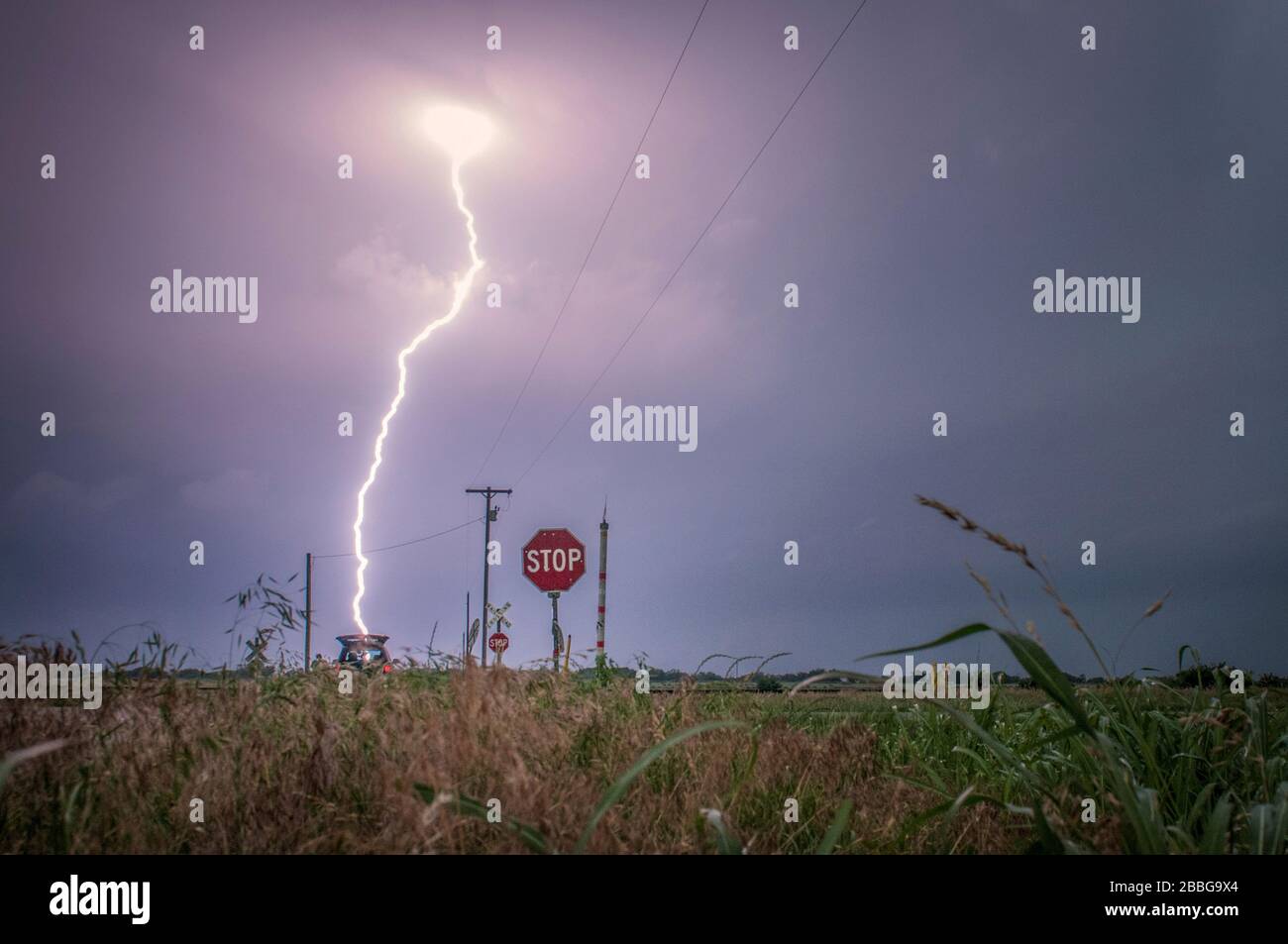 Storm with lightning strikes over a rural field in Oklahoma United ...