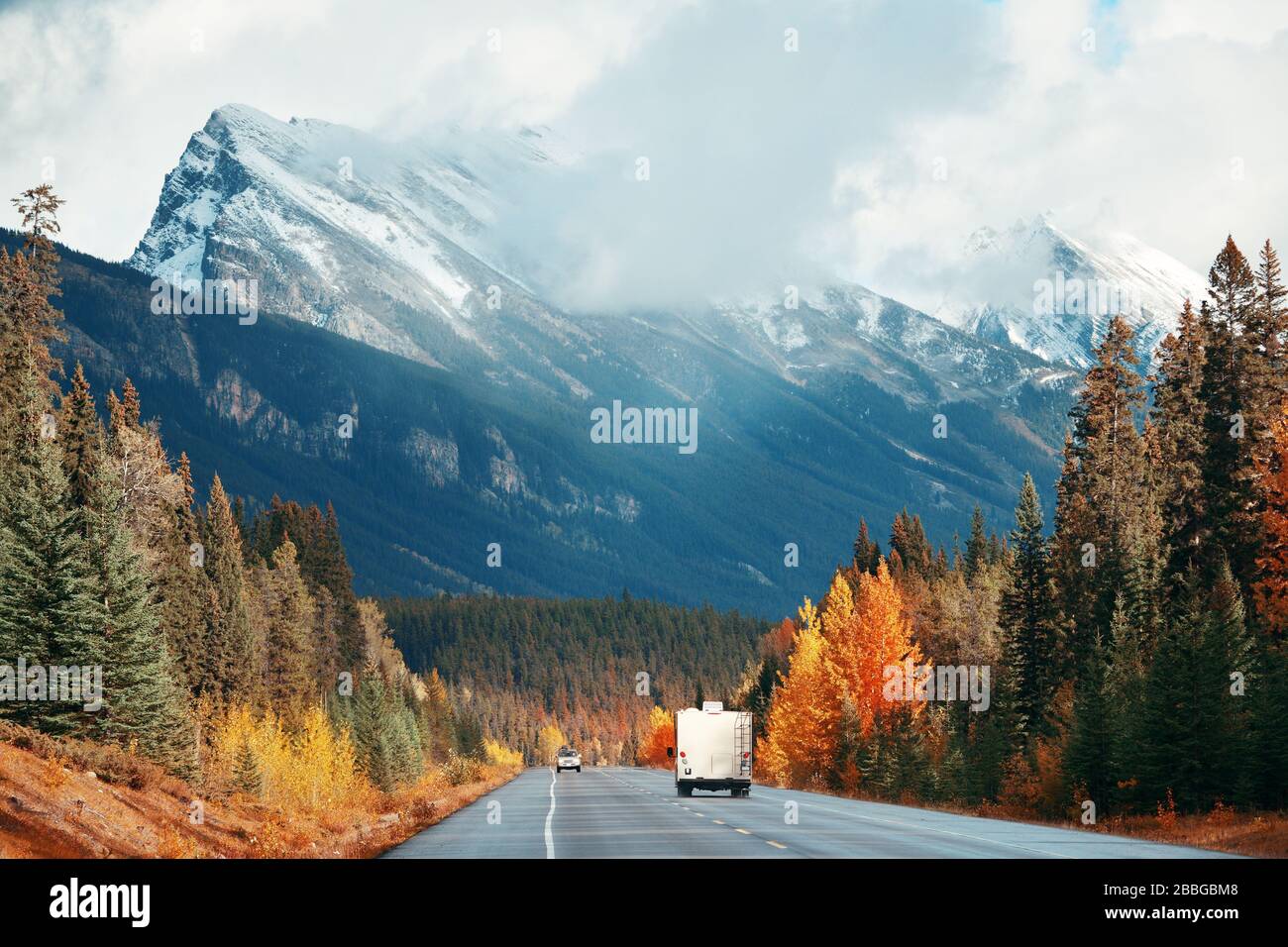 Car on road in Banff National Park in Canada Stock Photo - Alamy