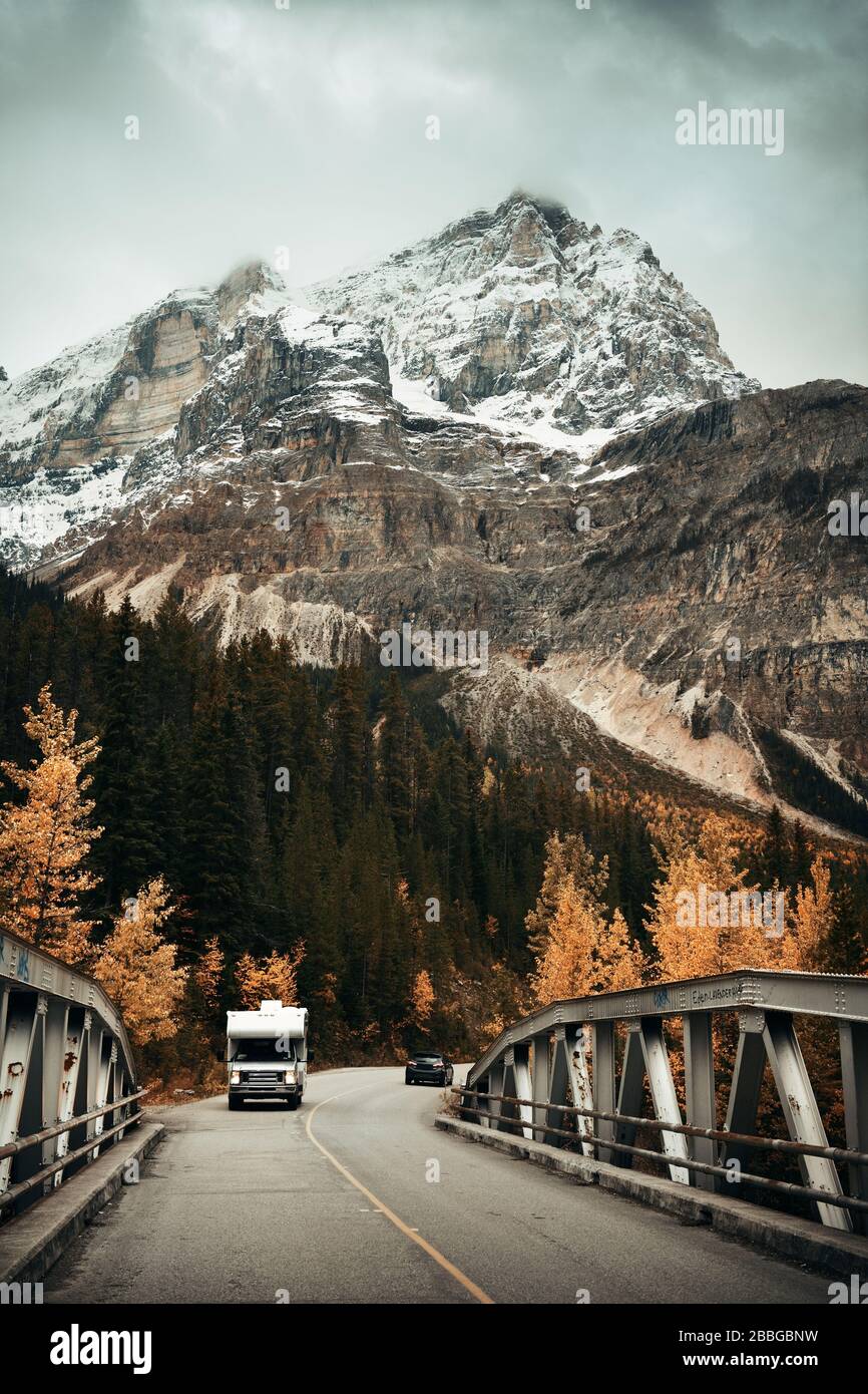 Car on road in Banff National Park in Canada Stock Photo - Alamy