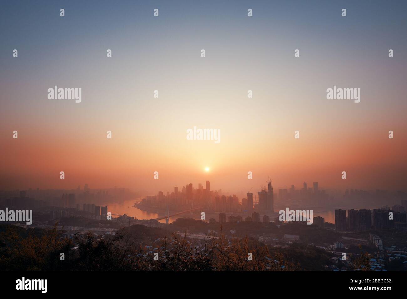 Urban buildings and city skyline at sunset in Chongqing Stock Photo - Alamy