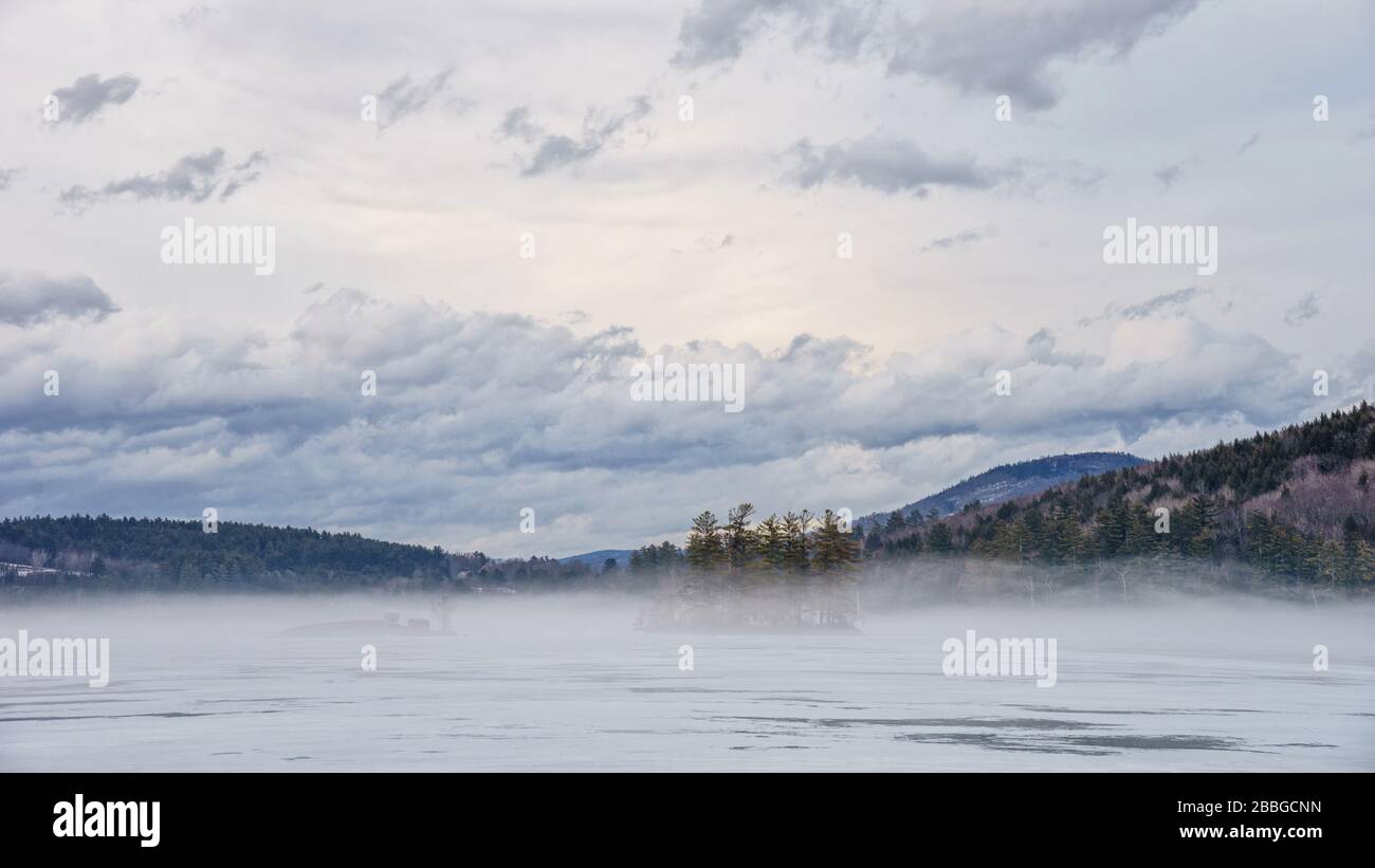 Fog on North Pond, Maine Stock Photo - Alamy