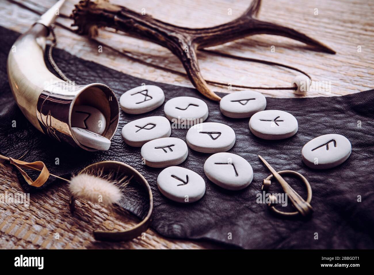 Side view of rune stones with various viking era style objects. Ancient ...
