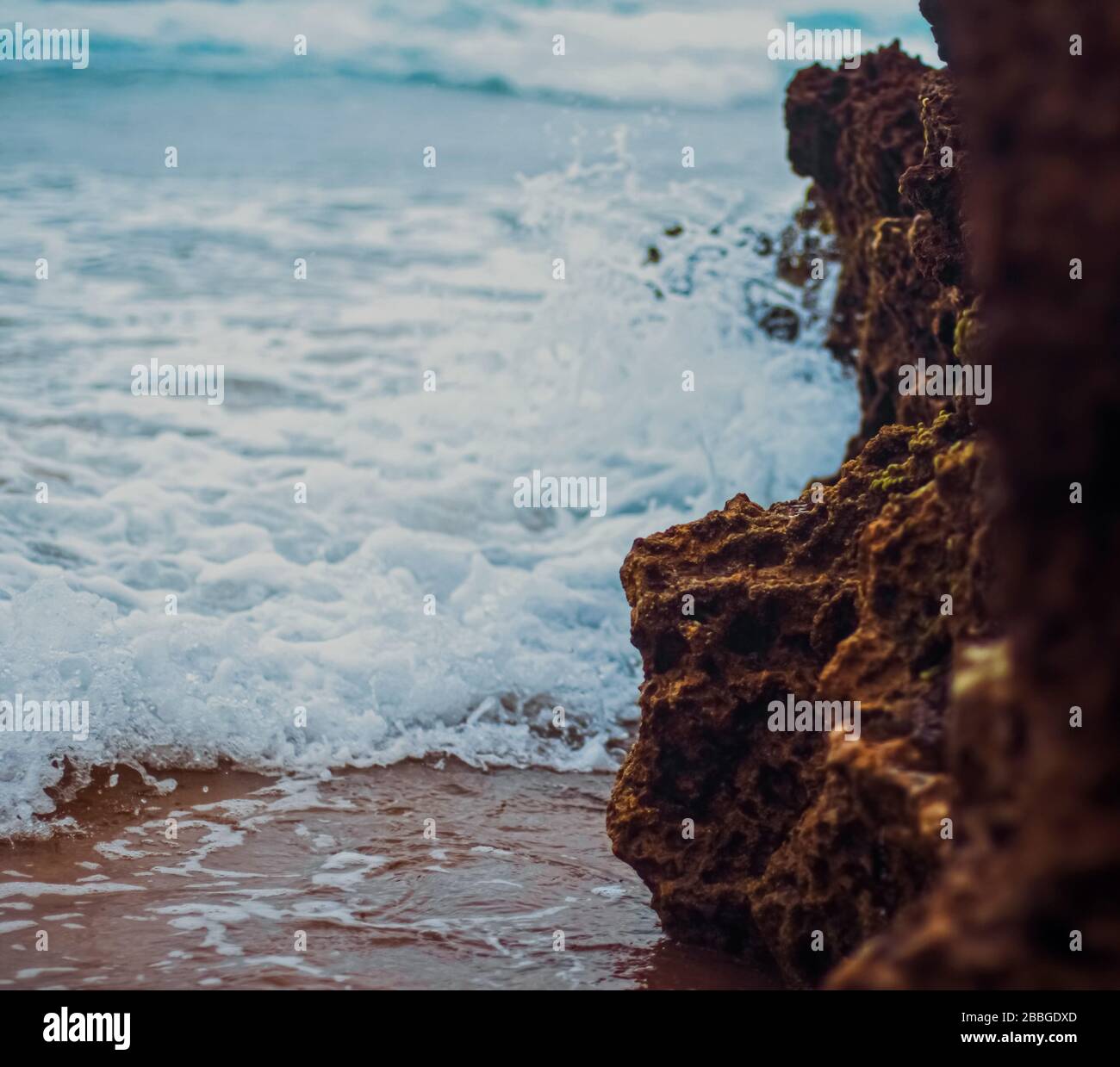 Storm in the ocean, sea waves crashing on rocks on the beach coast ...