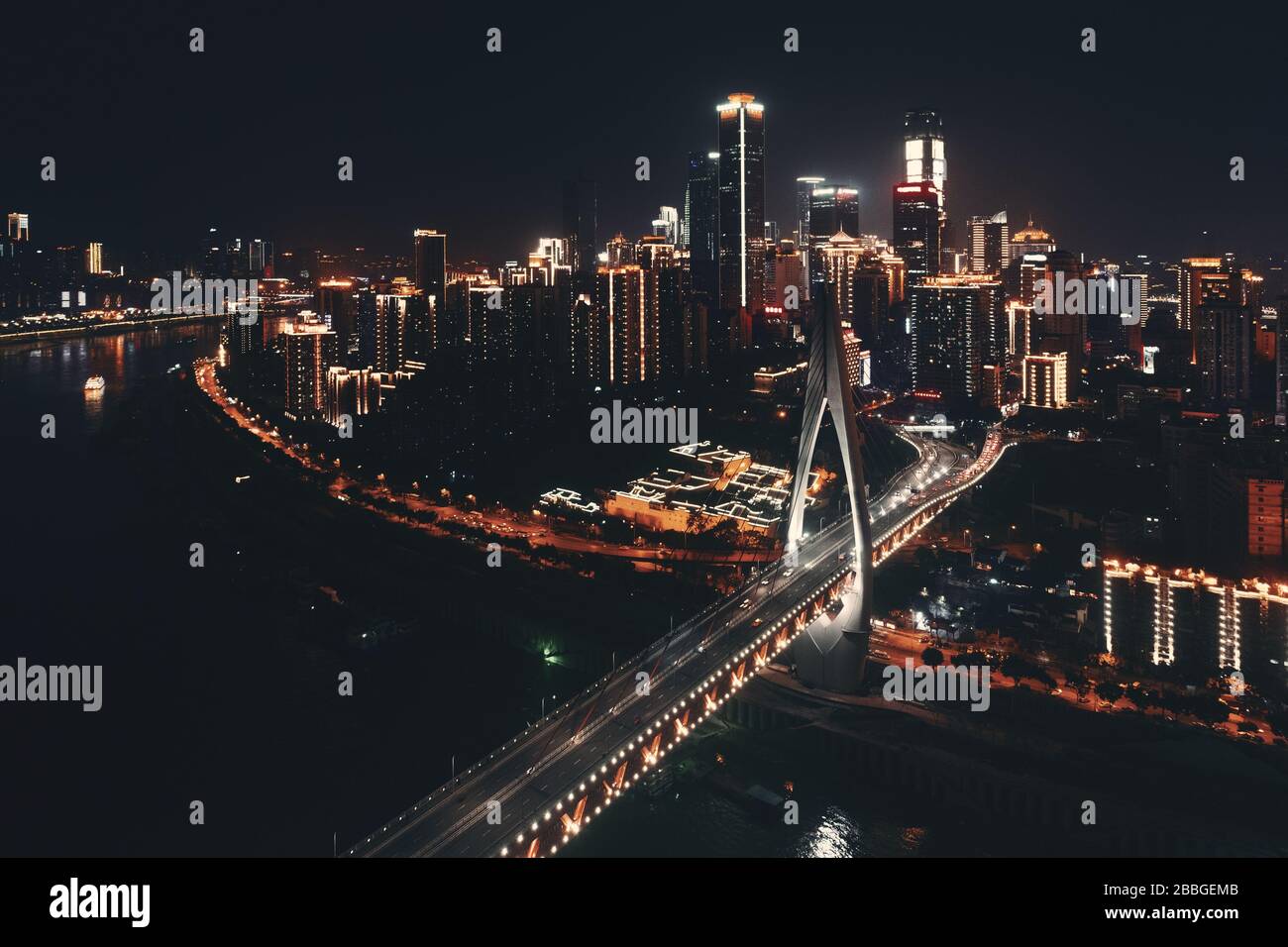 Aerial view of Bridge and city urban architecture at night in Chongqing ...