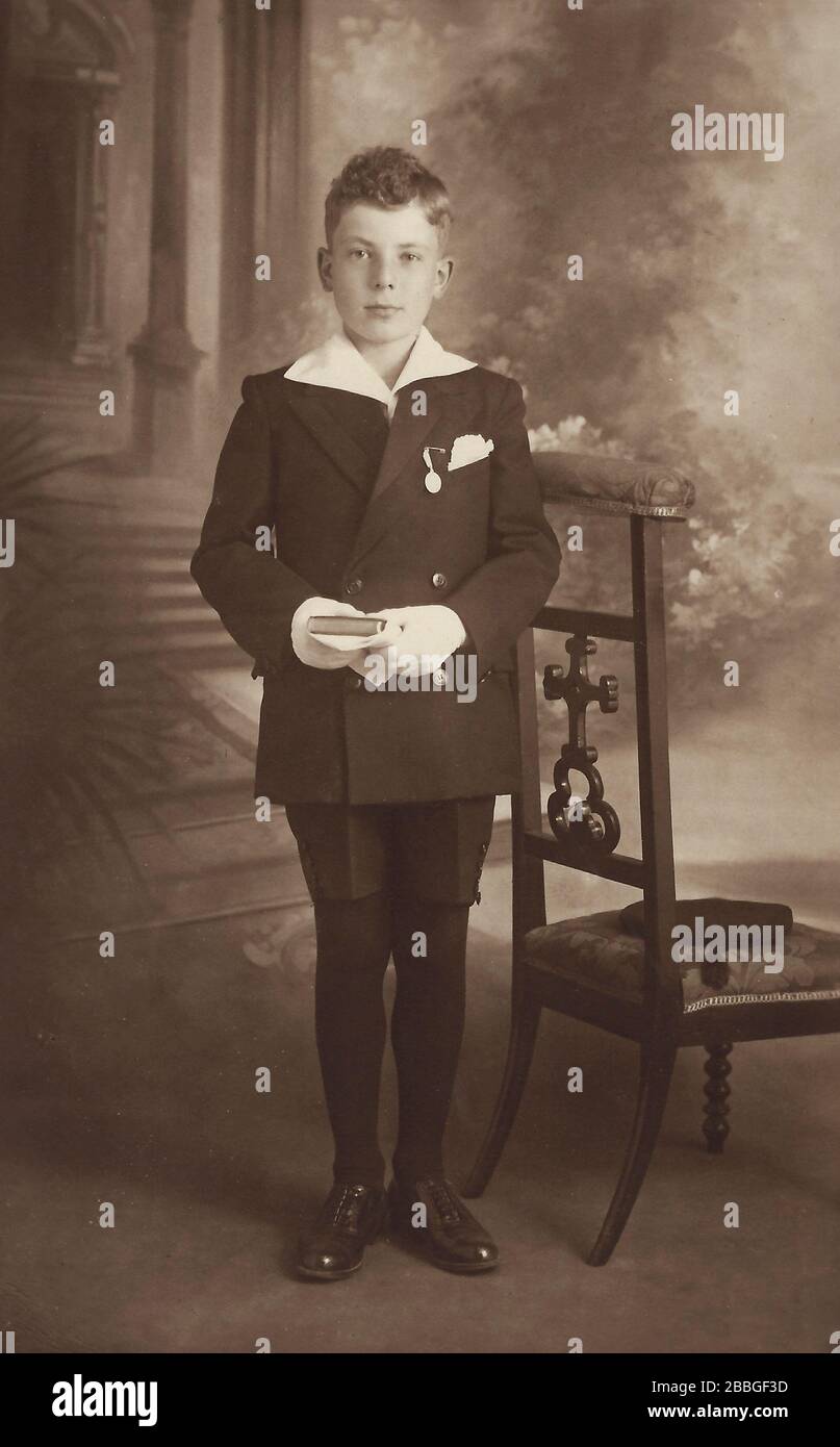 1910-1920 first or holy communion studio photo, a young boy in suit ...