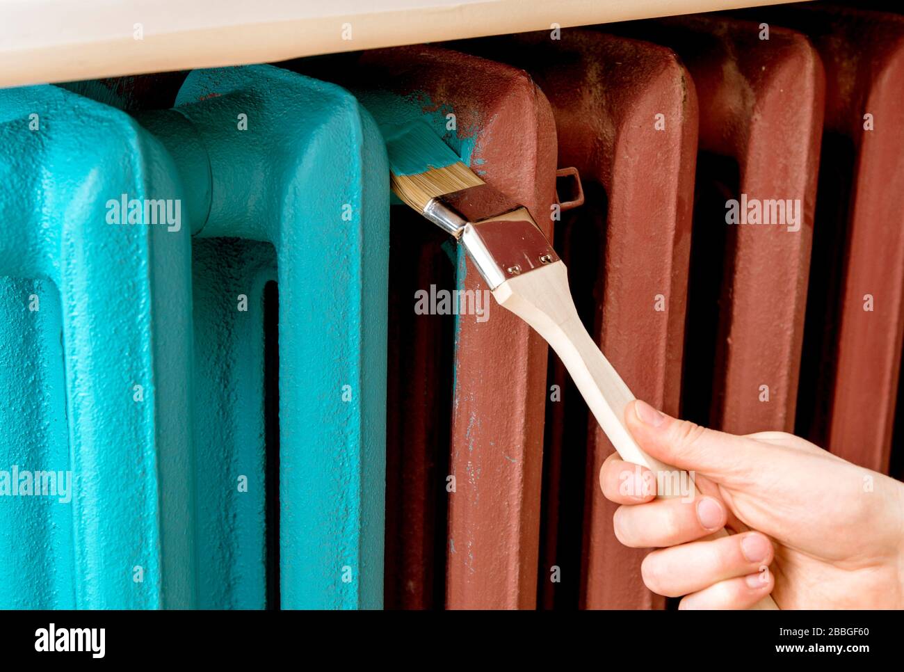 Home refreshing renovation concept. Close up view of man hand painting ...