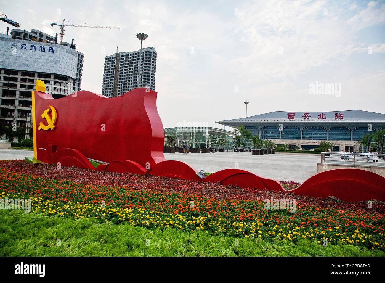 Entrance to China Xian Xi'an Railway Station with large Chinese flag ...