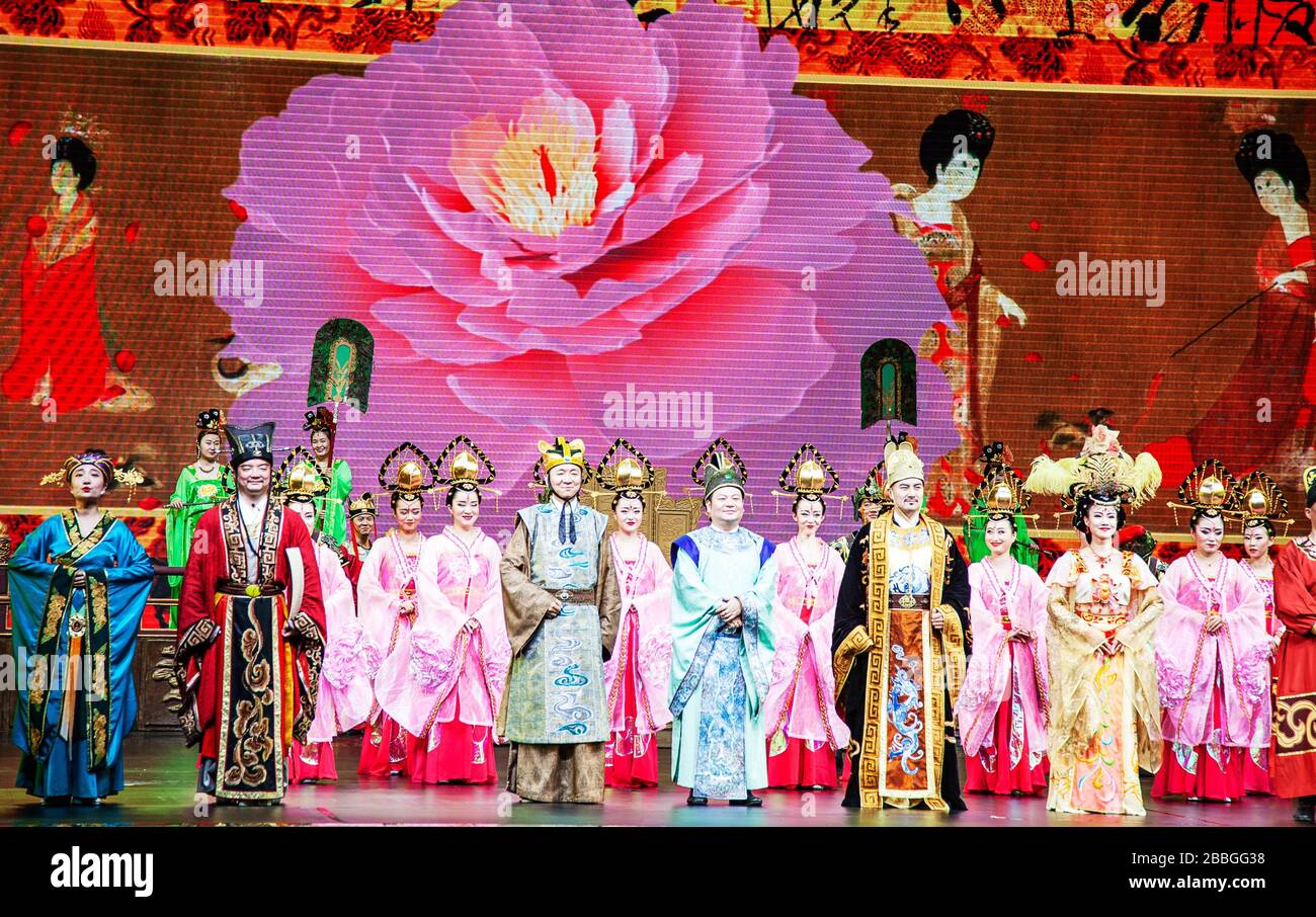 Cast on stage in traditional Chinese costume at Xian Xi'an Tang Dynasty ...