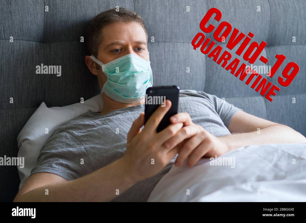Sick man with medical mask using mobile phone in bed. Home quarantine ...