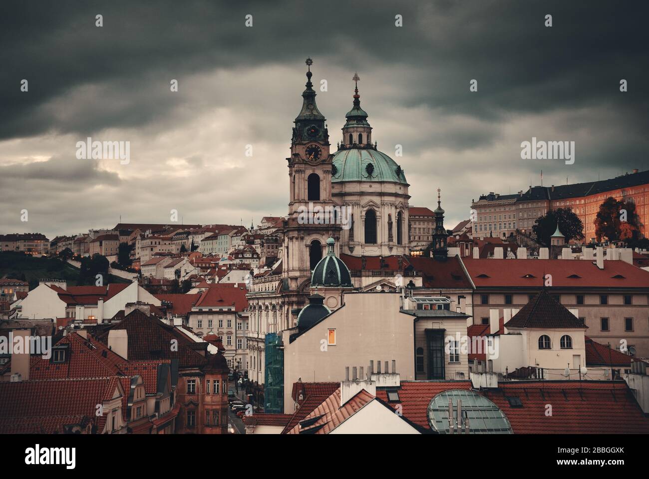 Prague skyline rooftop view with church and dome in Czech Republic ...