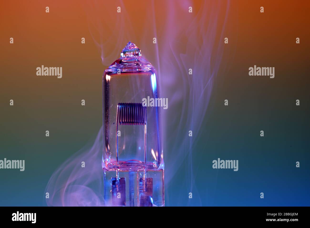 Electric light bulb with smoke photographed in the studio Stock Photo ...