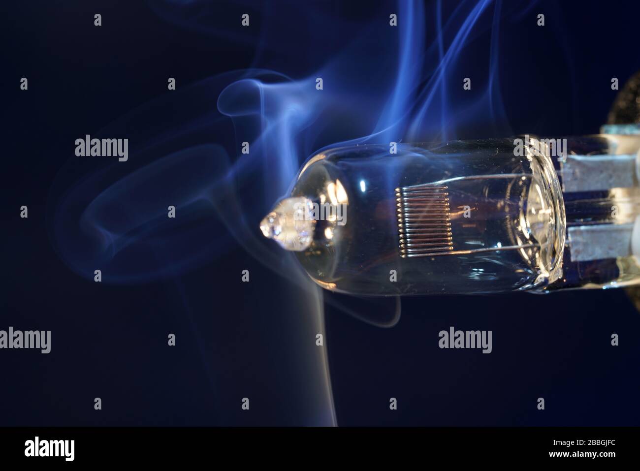 Electric light bulb with smoke photographed in the studio Stock Photo ...
