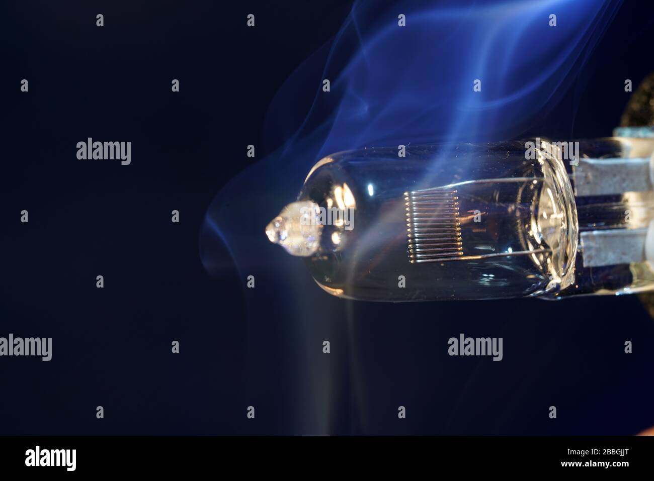 Electric light bulb with smoke photographed in the studio Stock Photo ...