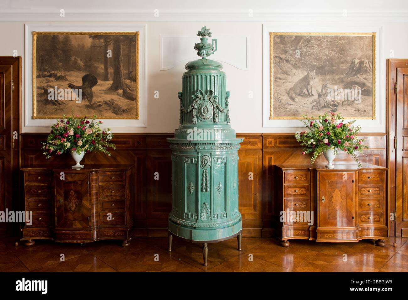 elegant historic dining room with wood paneling and paintings by Franz ...
