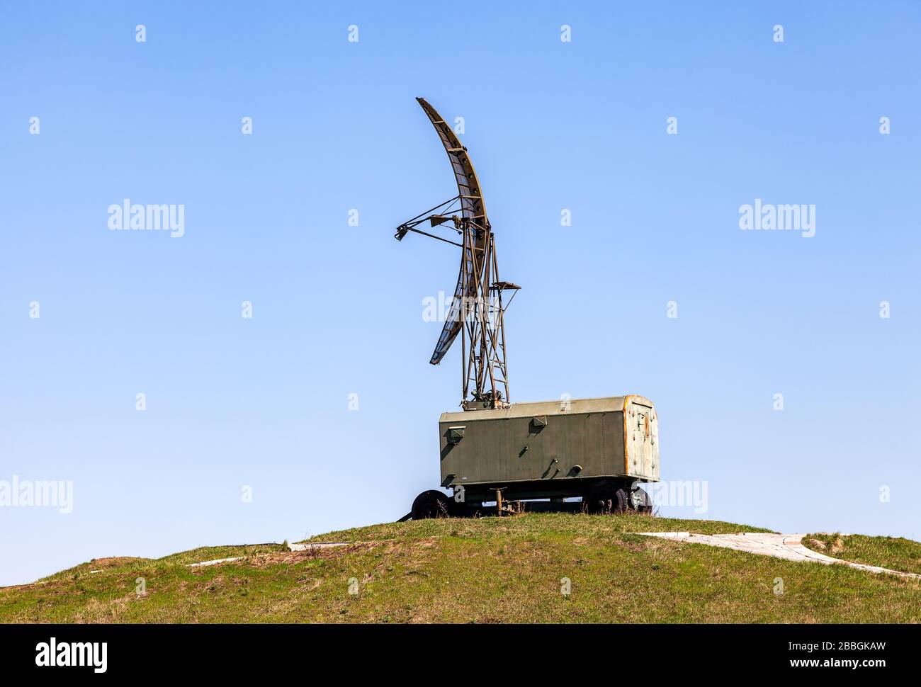 Old soviet military radar station against the blue sky. Military radio ...