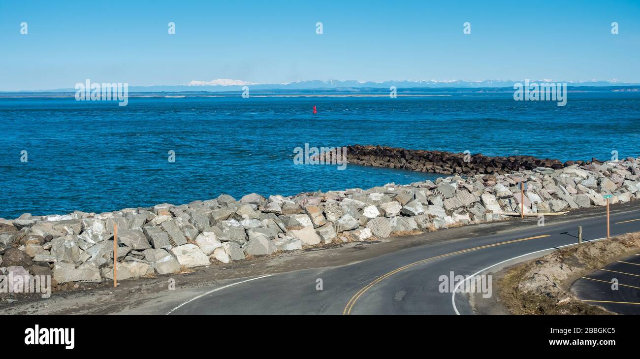 A view of a shoreline road and water in Westport, Washington Stock ...