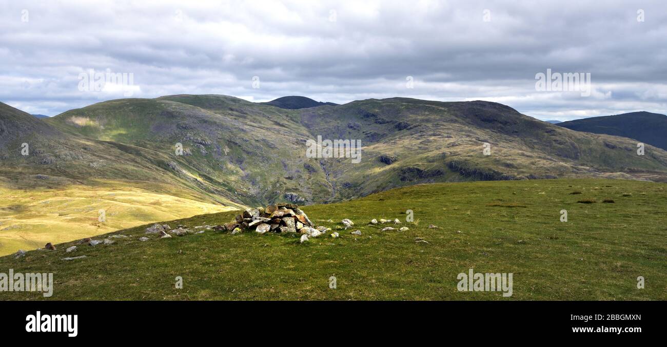 Pillar above Scoat Tarn and the stone ciarn Stock Photo - Alamy