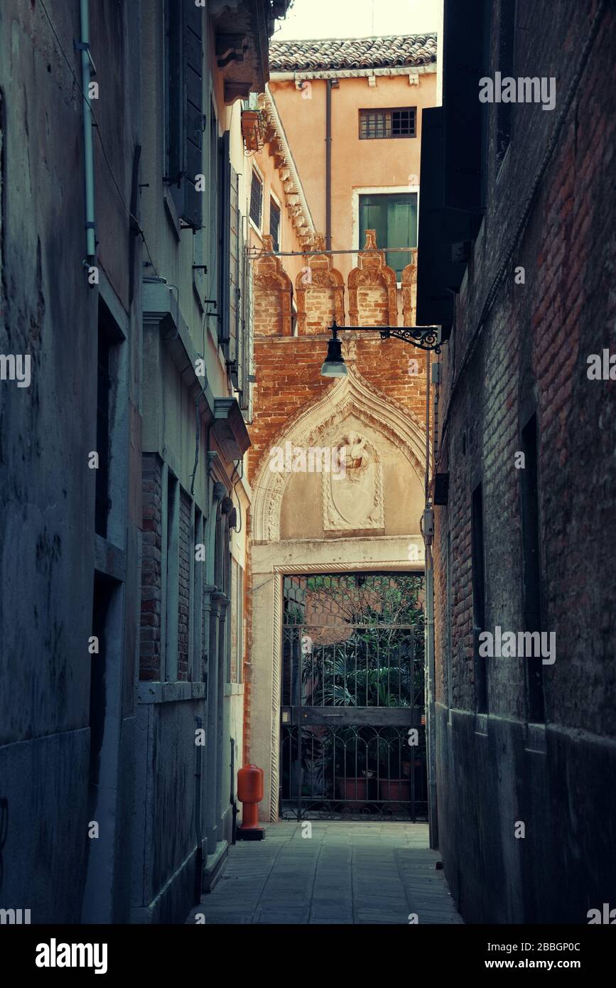 Alley view with historical buildings in Venice, Italy Stock Photo - Alamy