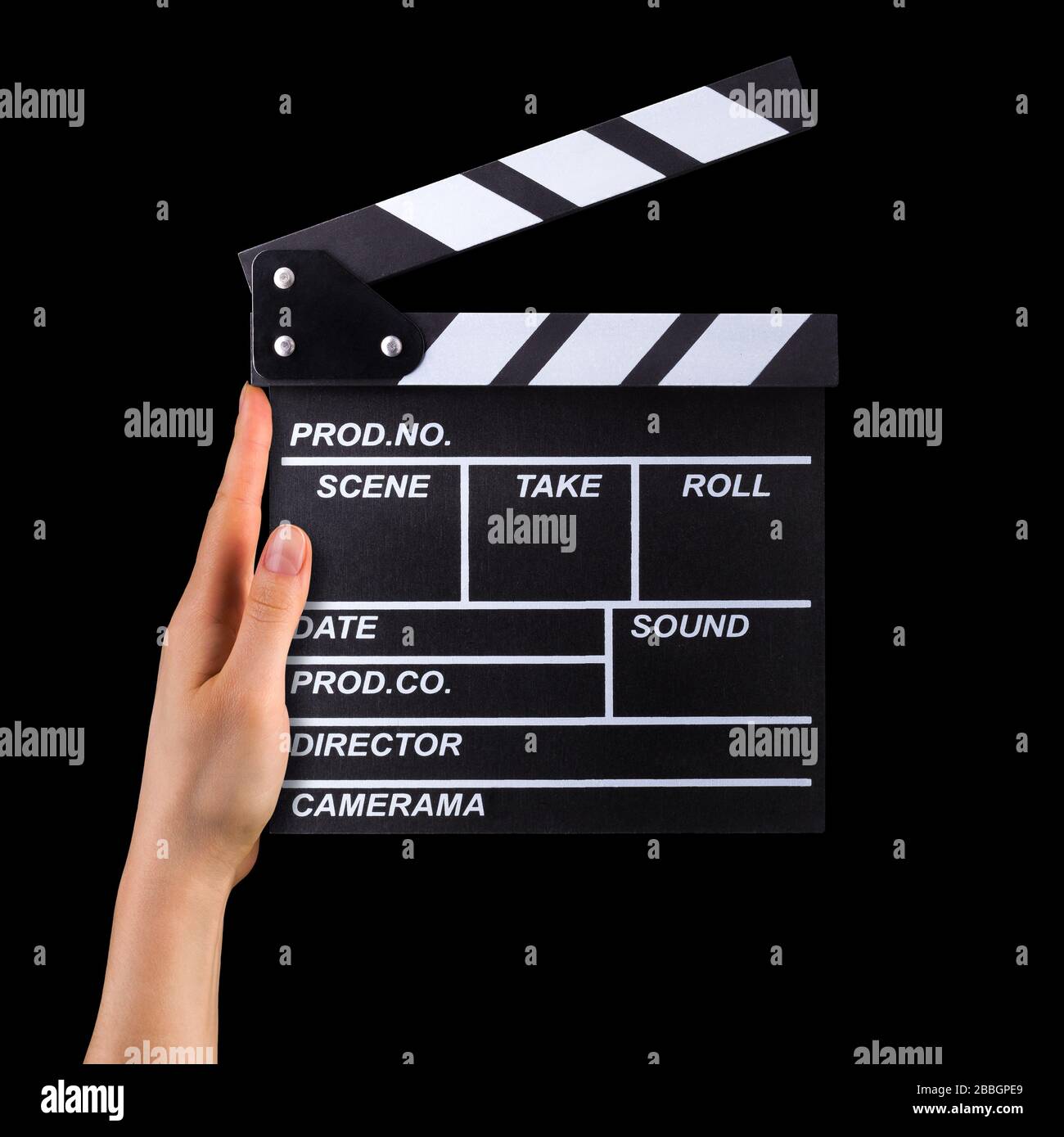 Human hand holding fiilm clapper board isolated on black background ...