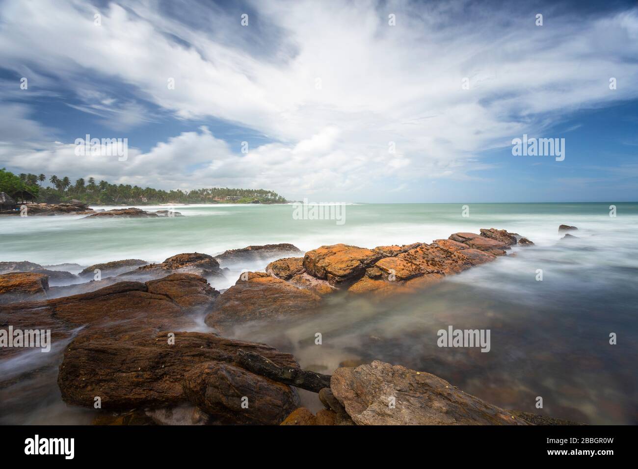 Rocks jutting out of ocean hi-res stock photography and images - Alamy