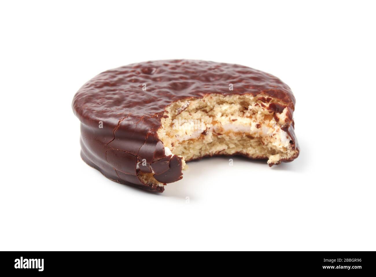 Bitten chocolate cake on white background Stock Photo - Alamy