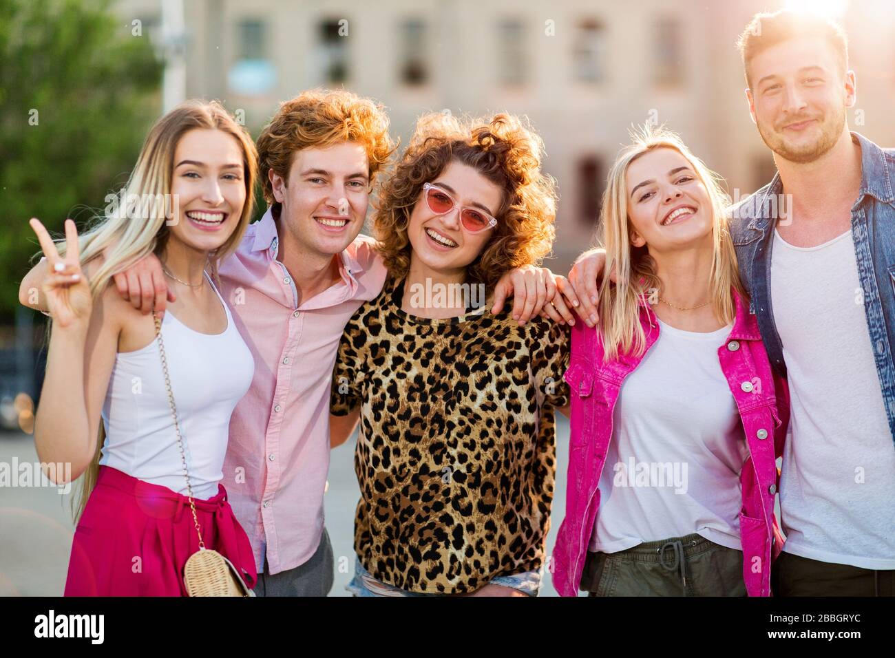 Group of friends having fun outdoors Stock Photo - Alamy