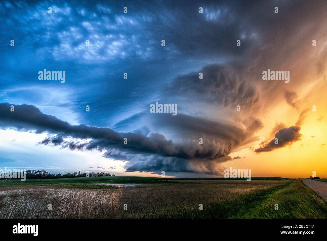 Spinning mesocyclone tornado warned storm over rural gravel road and ...