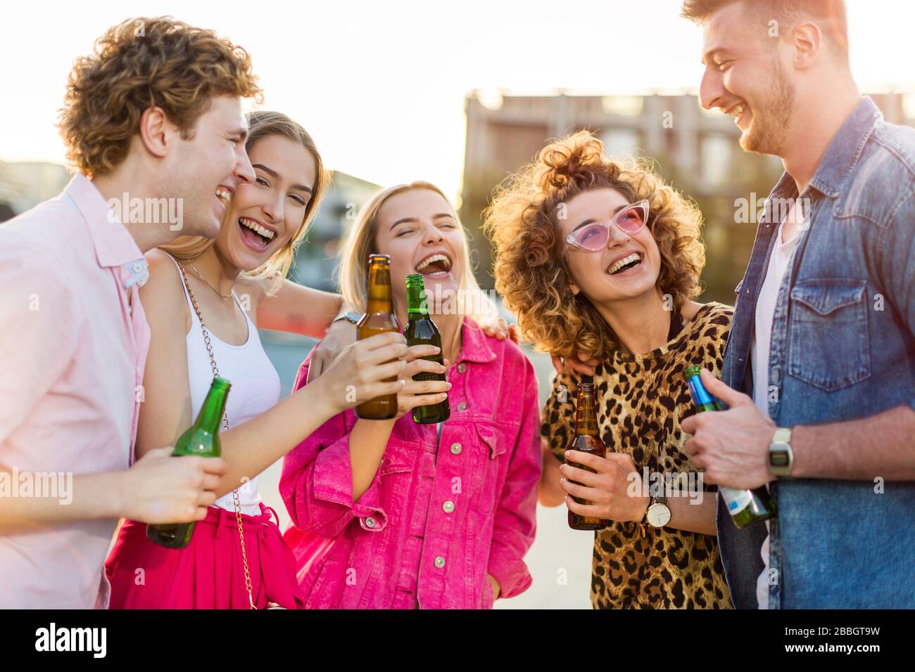 Group of friends having fun outdoors Stock Photo - Alamy