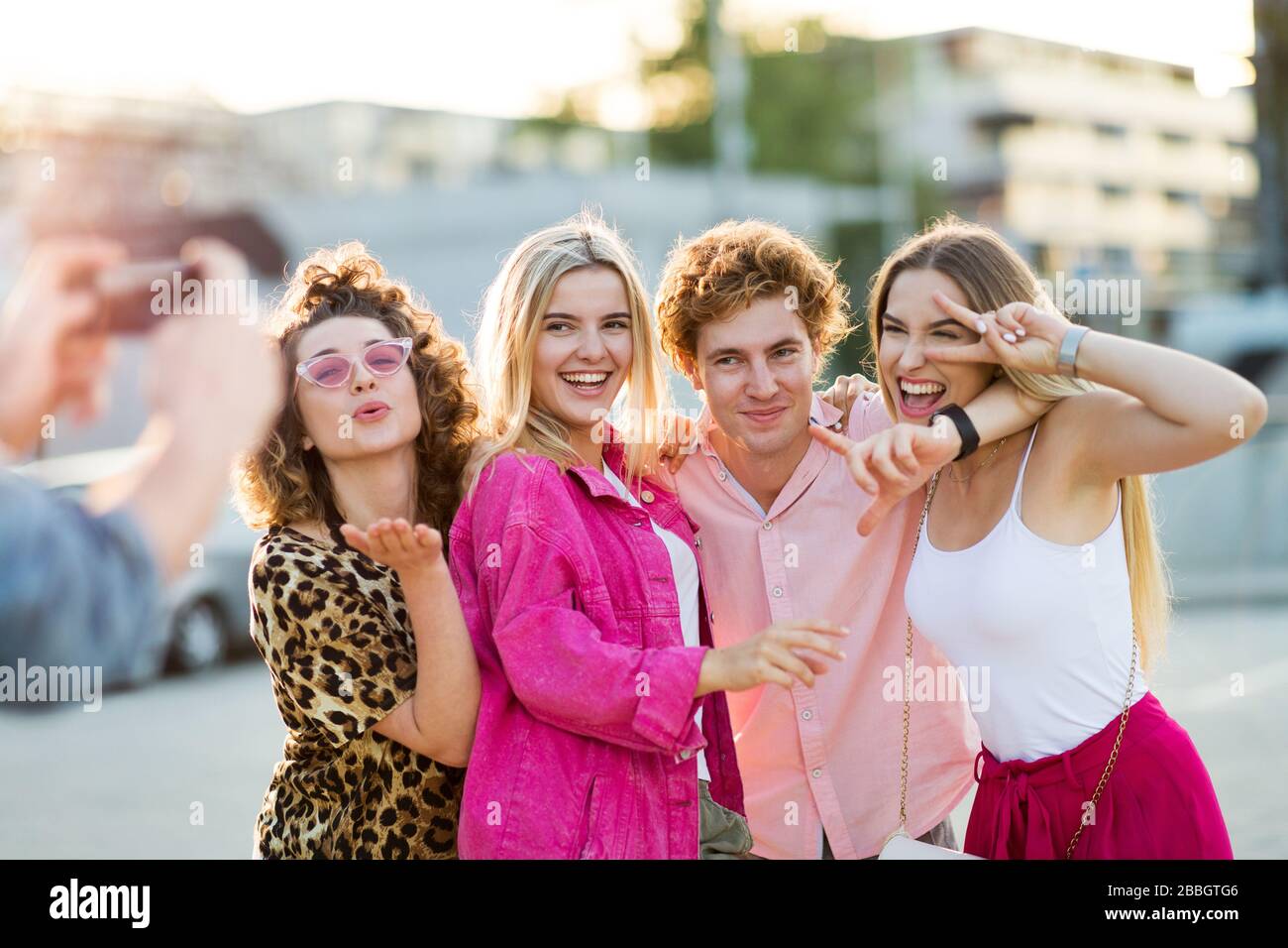 Group of friends having fun outdoors Stock Photo - Alamy
