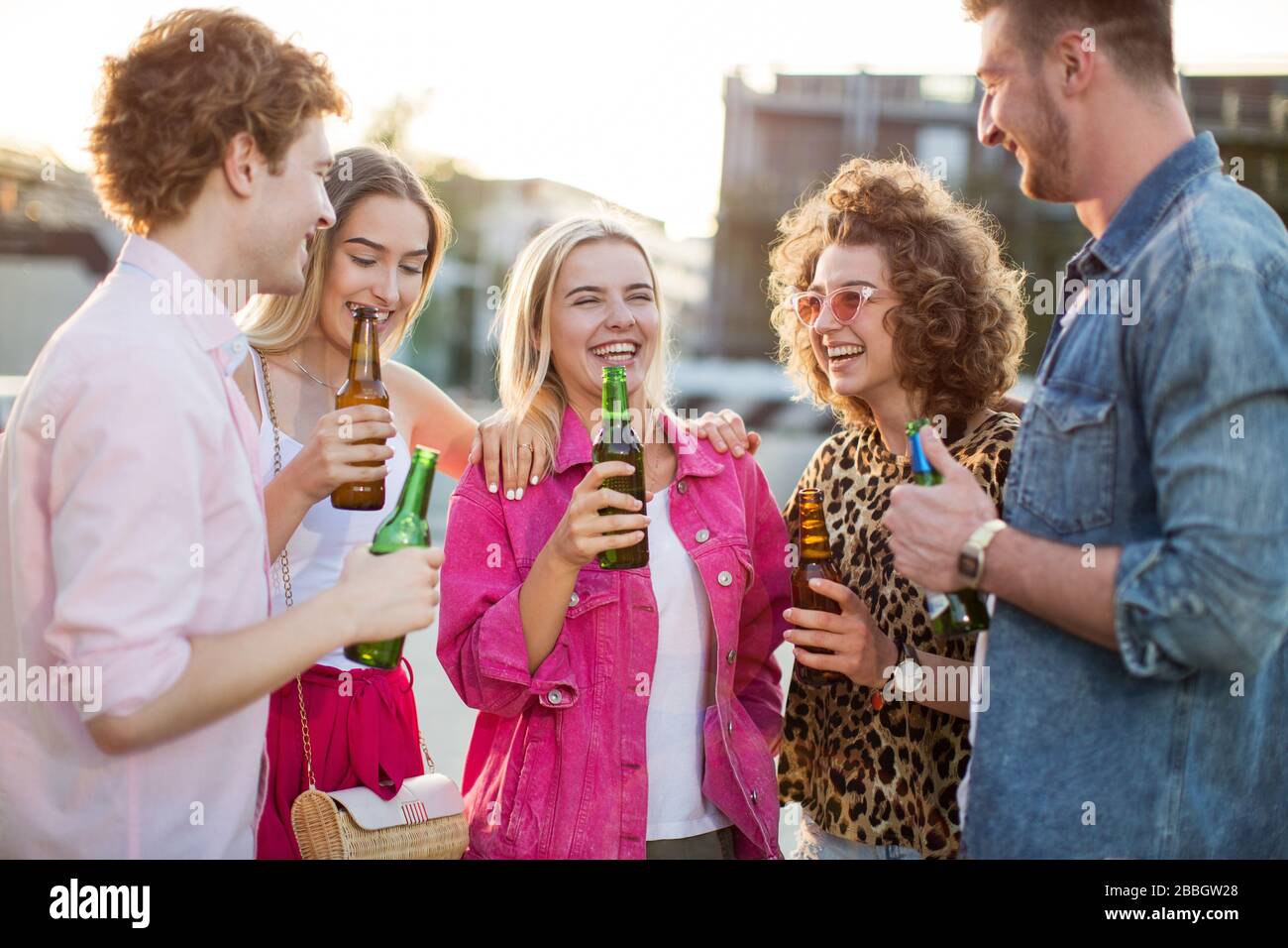 Group of friends having fun outdoors Stock Photo - Alamy