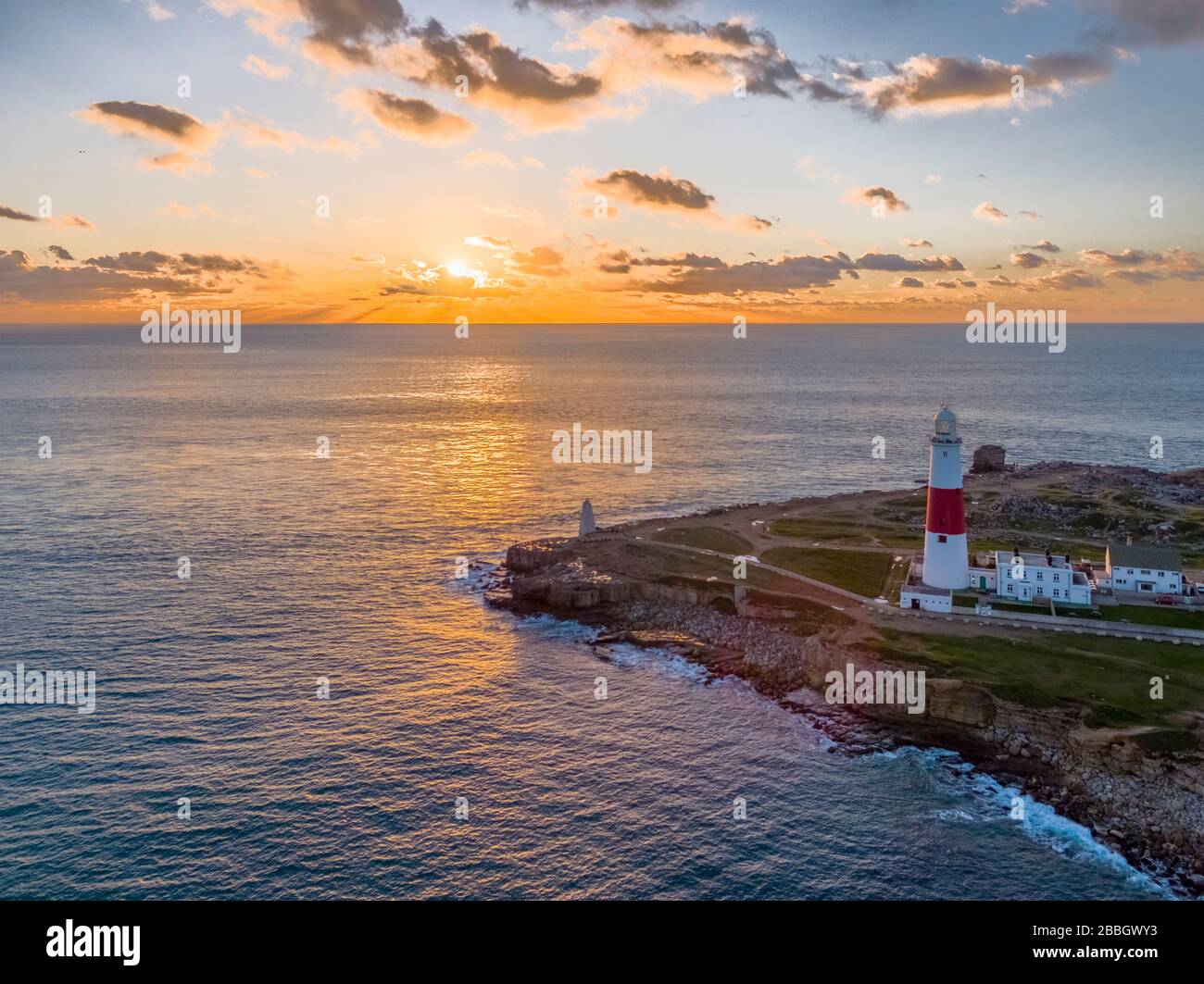 UK, England, Dorset, Portland Bill, Portland Bill Lighthouse, Sunset ...