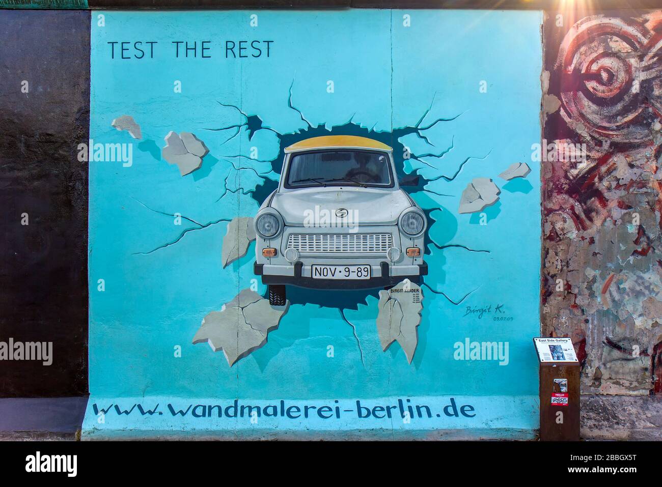 Trabant car grafiiti on the Berlin wall Stock Photo - Alamy