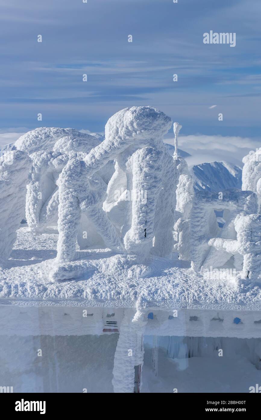 frozen buildings on the mountain top Stock Photo - Alamy