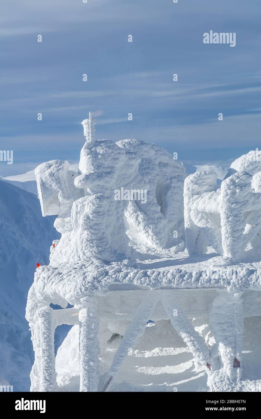 frozen buildings on the mountain top Stock Photo - Alamy