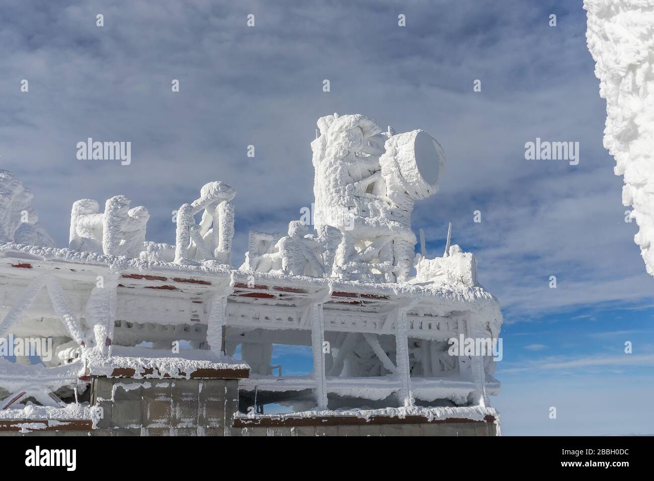 frozen buildings on the mountain top Stock Photo - Alamy