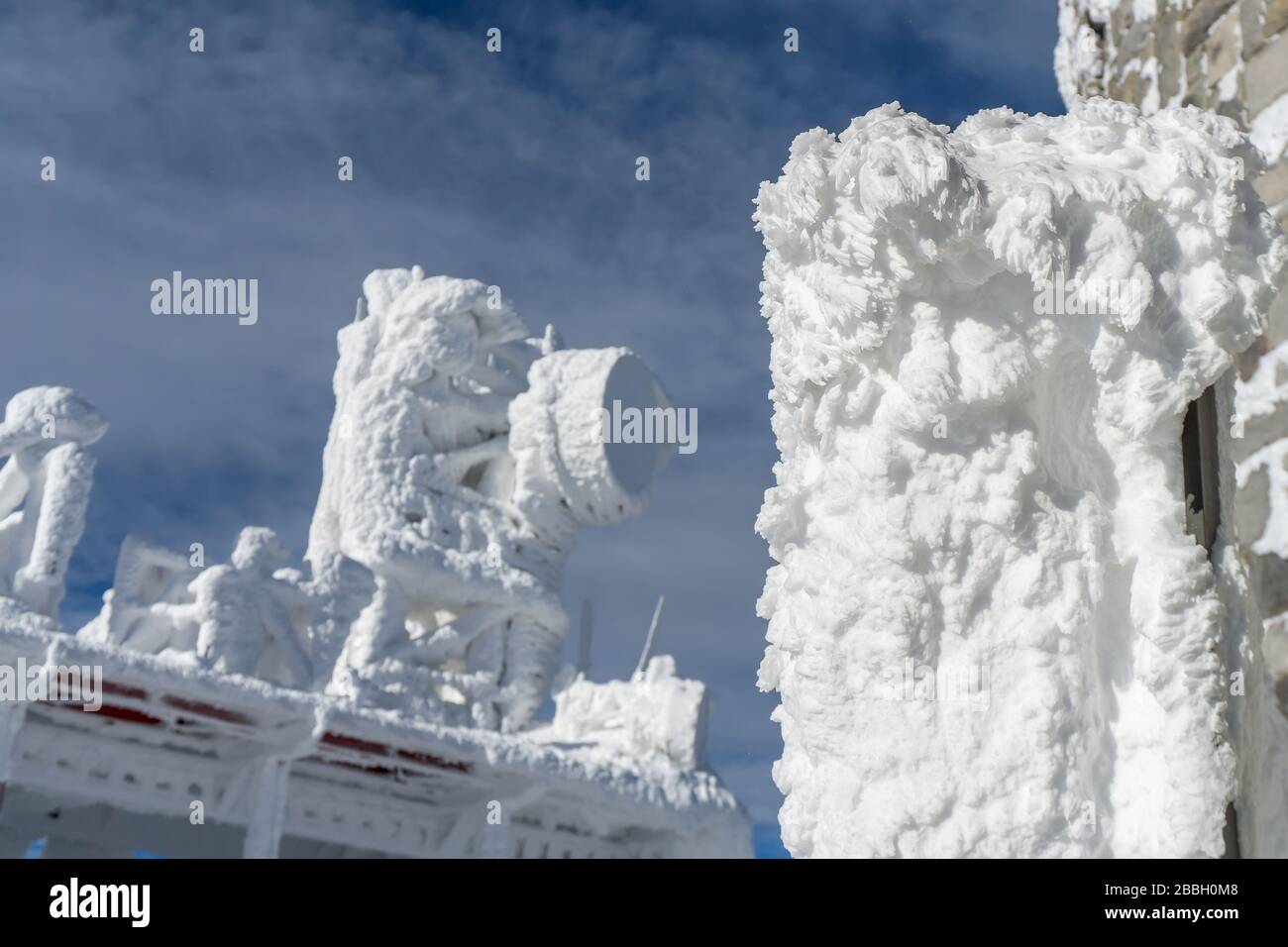 frozen buildings on the mountain top Stock Photo - Alamy