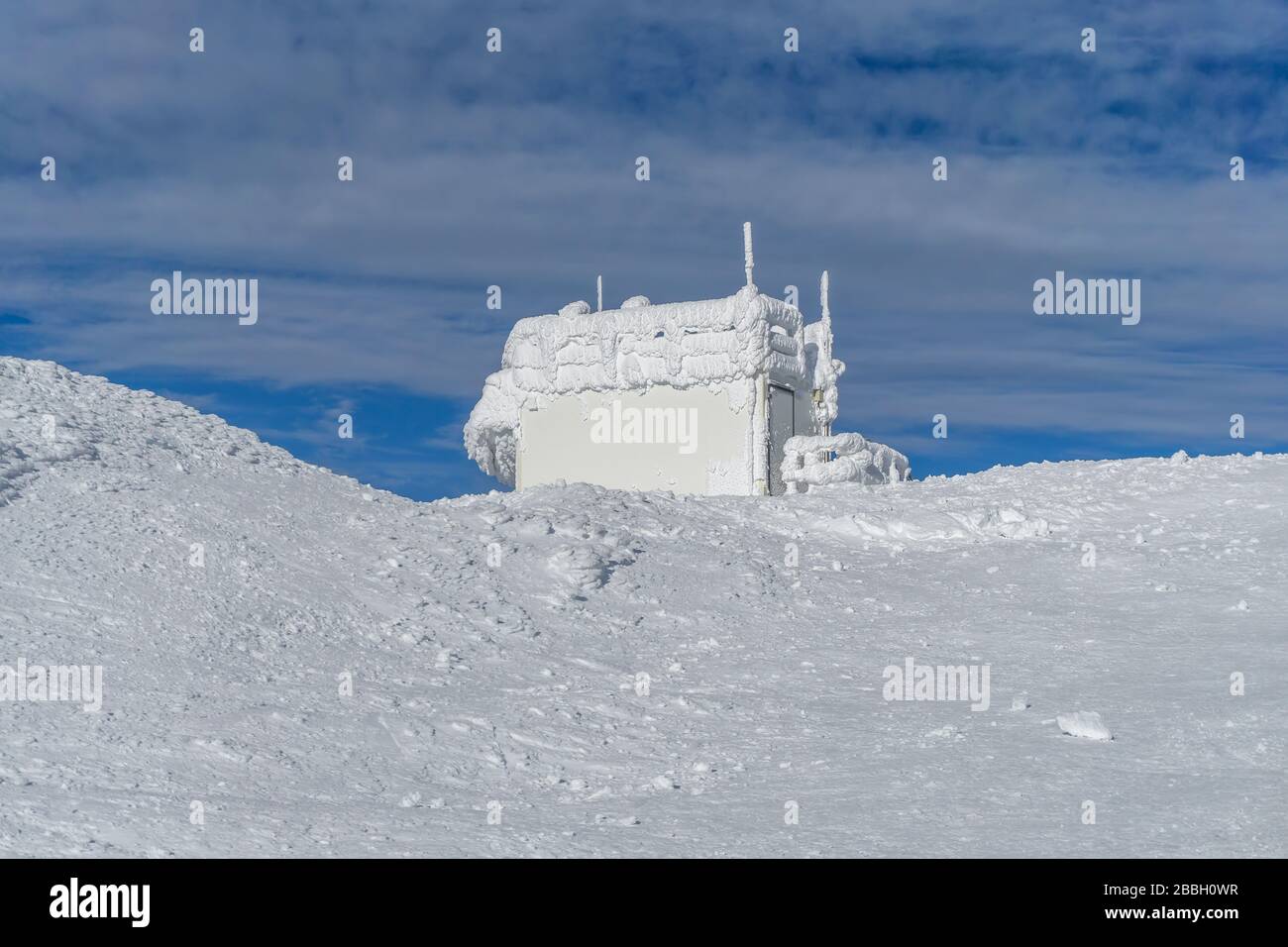 frozen buildings on the mountain top Stock Photo - Alamy