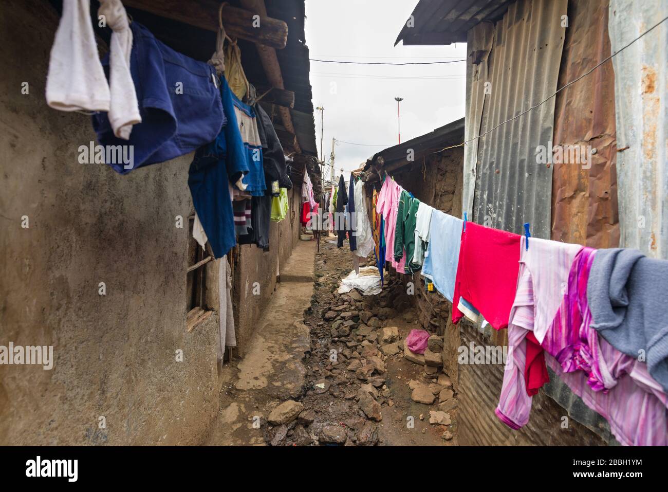Clothes drying outside buildings and metal slum shacks, Nairobi, Kenya ...