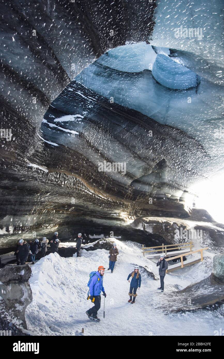 This cave in Iceland is a naturally formed tunnel made from layers of ...