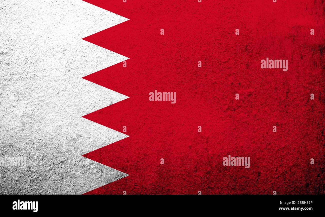 The Kingdom of Bahrain national flag. Grunge background Stock Photo - Alamy