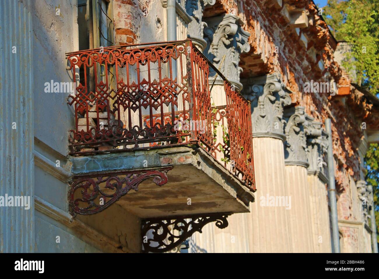 Balcony of an old destructive building. Safety precautions. Selective ...