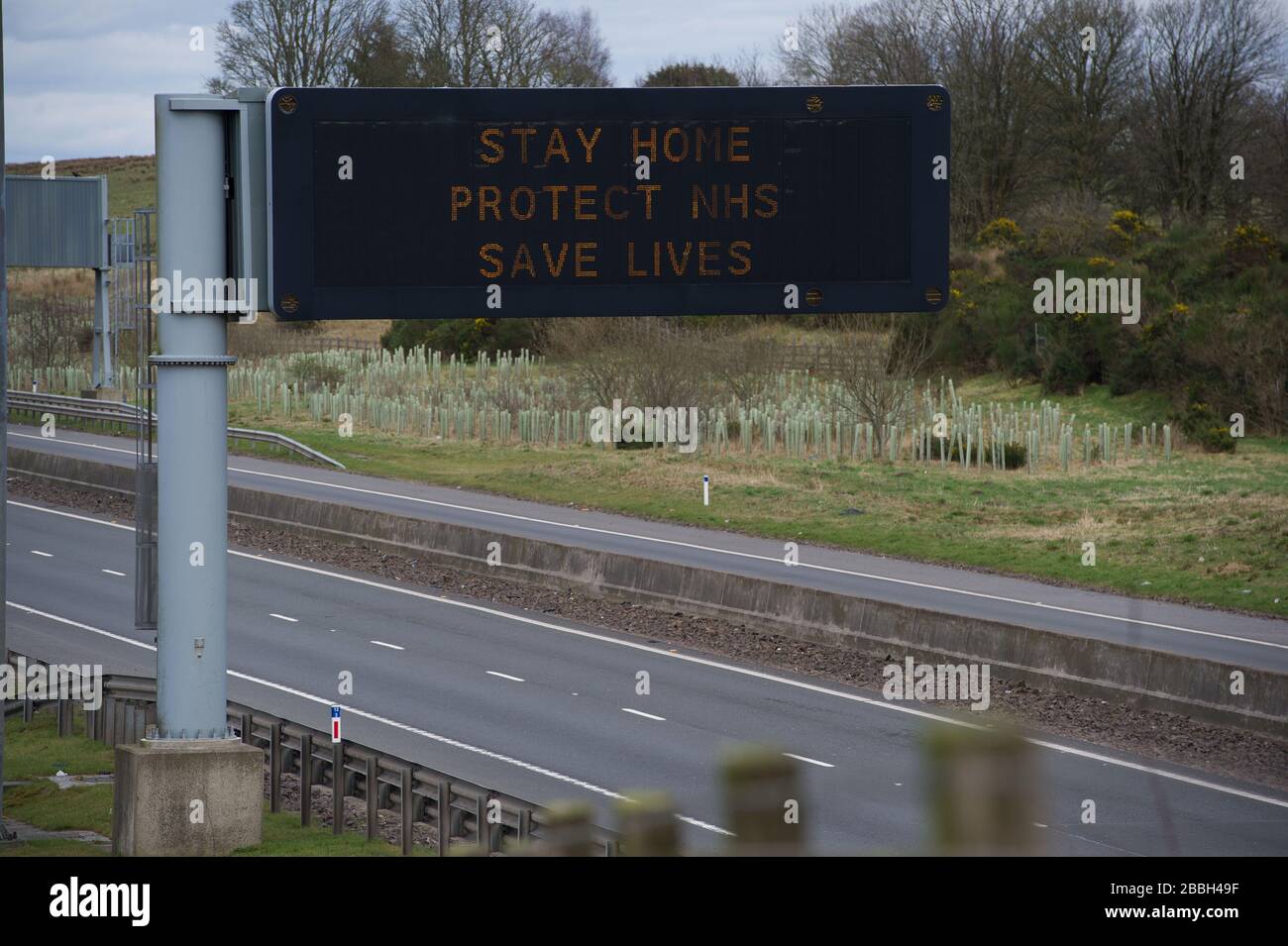 Motorway sign advising to stay home and save lives hi-res stock ...