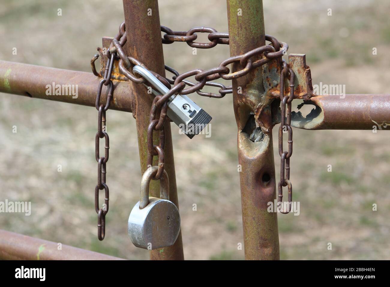 Chain, gate, and lock Stock Photo - Alamy
