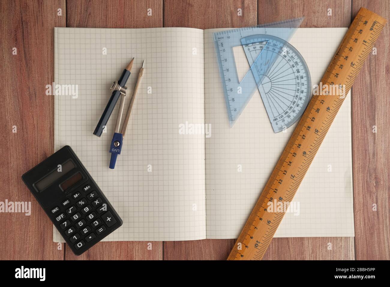 School supplies used in math , geometry or science Stock Photo - Alamy
