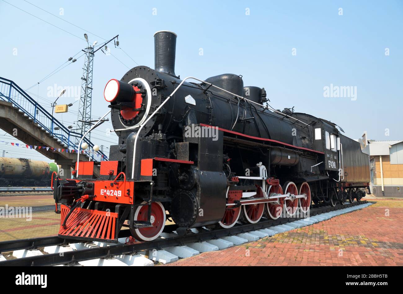 A soviet class Em steam locomotive in the railway station of Vikhorevka ...
