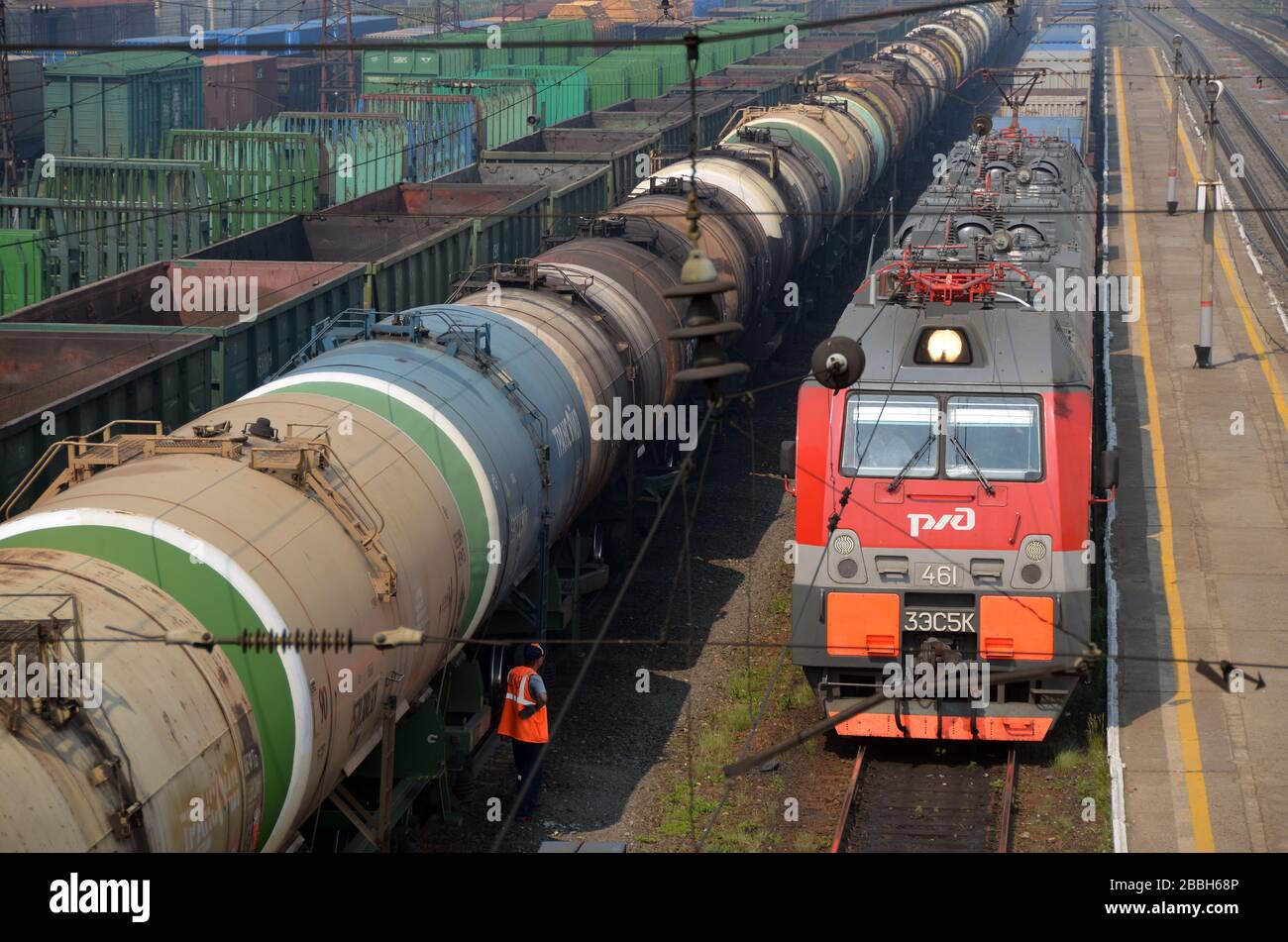 Freight trains on the BAM railway line in the railway sation of ...
