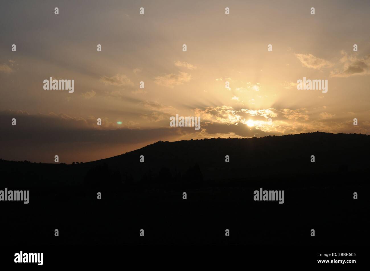 Charming sunset. The beautiful sun set evening Stock Photo - Alamy